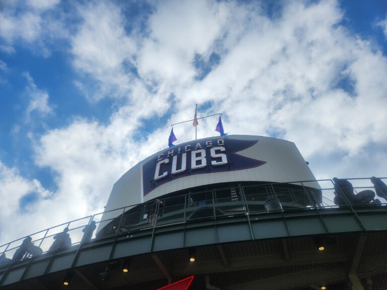 What the Eamus Catuli Sign Across Wrigley Field Actually Means